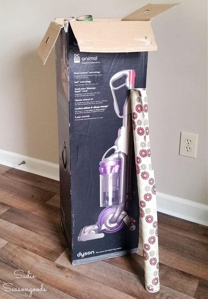 Vertical Wrapping Paper Storage from a Wood Counter Stool