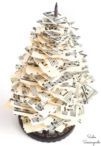 Neutral Christmas Decor with a Receipt Spike and Old Sheet Music